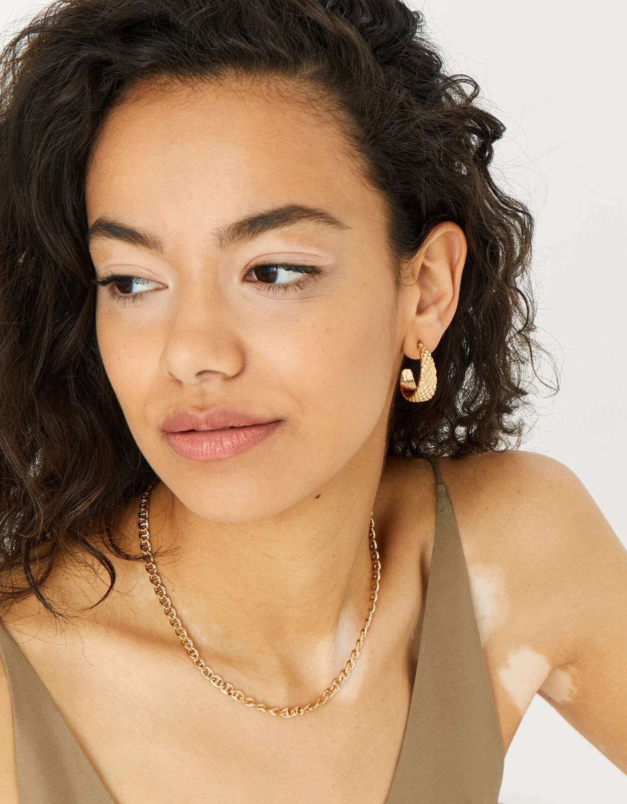 reliquia fine swirl earrings Syncro System