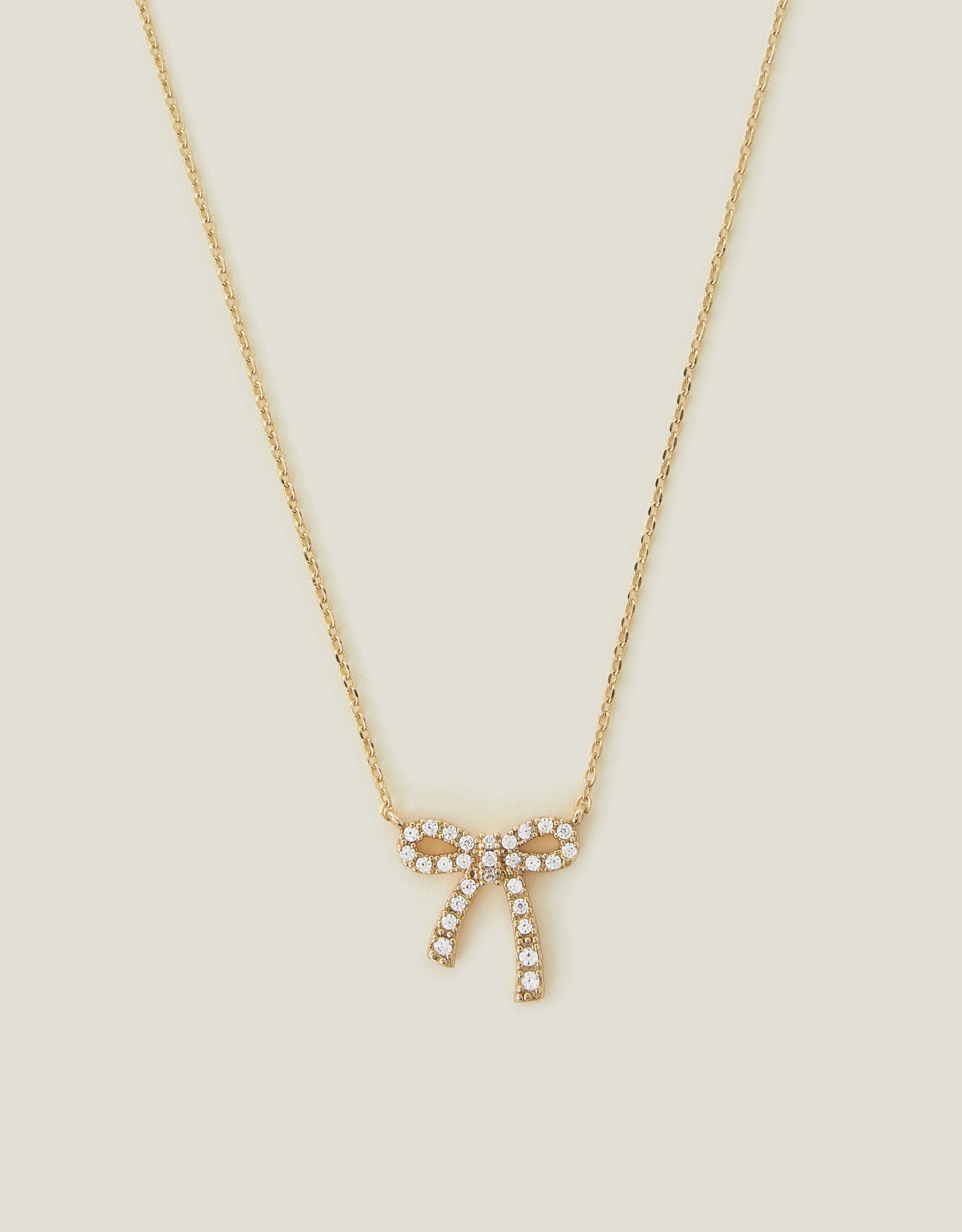 14ct Gold-Plated Diamante Bow Pendant Necklace | Necklaces | Accessorize UK